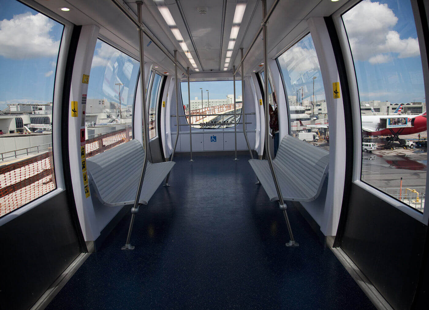 In Miami Airport, 2 Automated People Mover POMA carry passengers